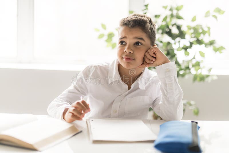 A Cute Black Boy Doing Homework at Home Stock Image - Image of desk ...