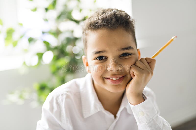 A Cute Black Boy Doing Homework at Home Stock Photo - Image of ...