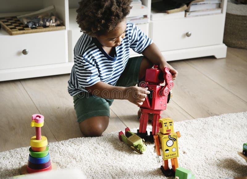 Black Boy Playing Robot at Home Stock Photo - Image of game, gadgets ...