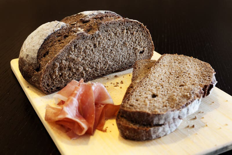 Black bread stock photo. Image of commodity, cutting - 57621874