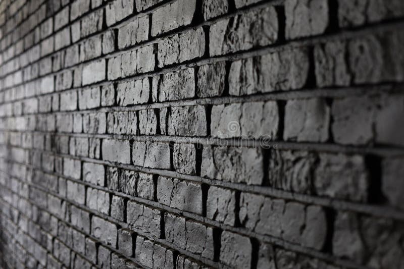 Black Brick Wall Texture with Sharp Edges and Varying Shadows Creating ...