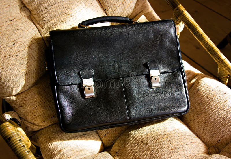 Black Briefcase on a Wicker Chair Stock Image - Image of interior, home ...