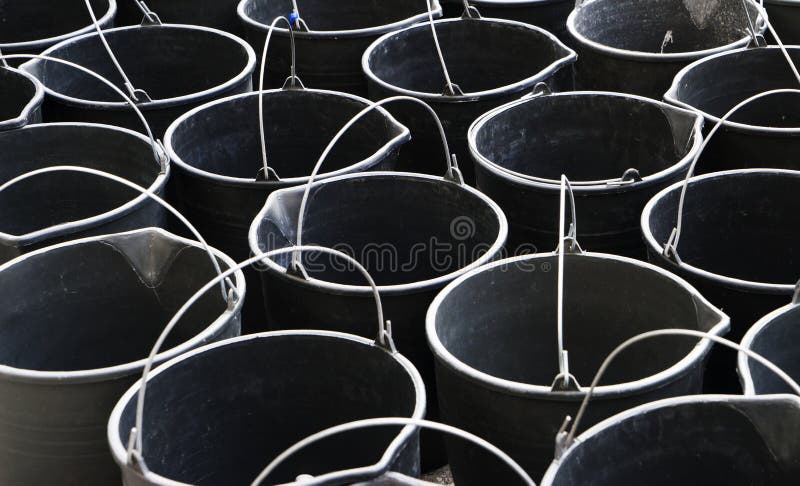 The black buckets pails stock image. Image of group, bucket - 88987341