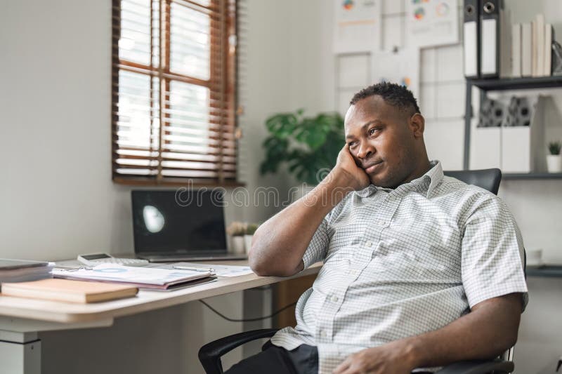 Black Business Man is Stressed, Bored, and Overthinking from Working on ...