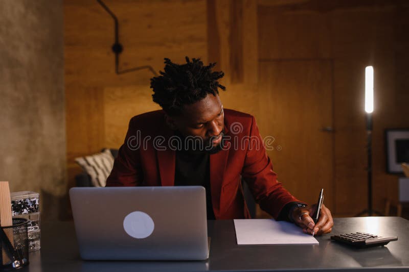 Black Business Man Working on Laptop and Taking Notes Stock Image ...
