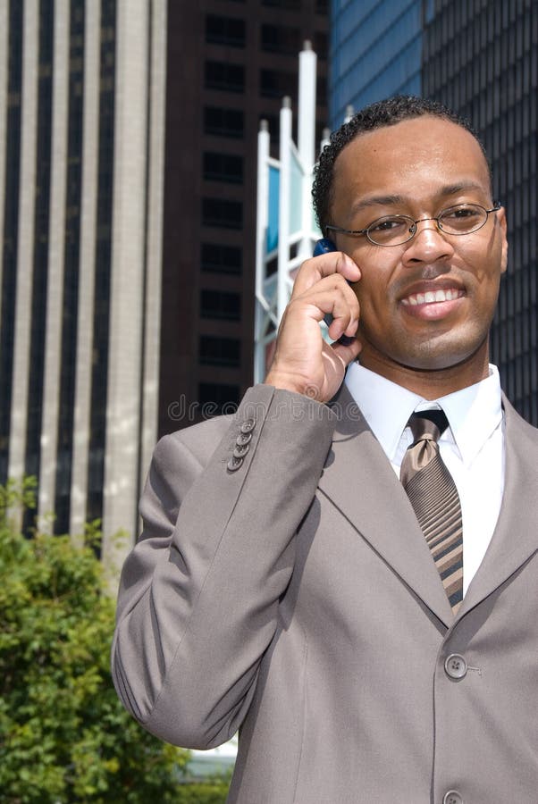 Black Businessman on Cell Phone Stock Image - Image of executive, phone ...