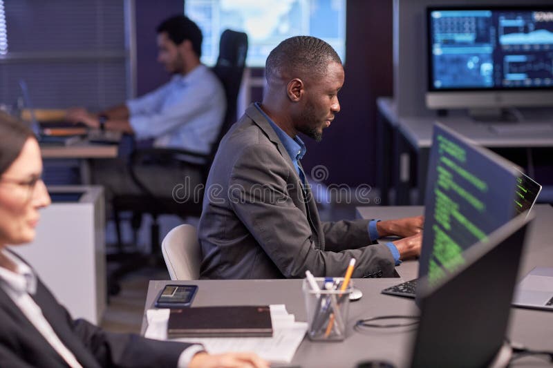 Black Businessman Using Computer in it Office Stock Photo - Image of ...