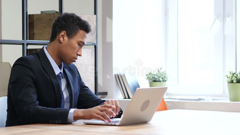 Black Man Waiting at Work, Watching Time Stock Footage - Video of ...