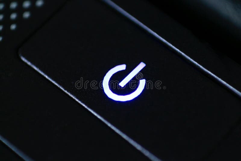 Black Button Start Flashing Blue Light. Closeup Stock Photo - Image of ...