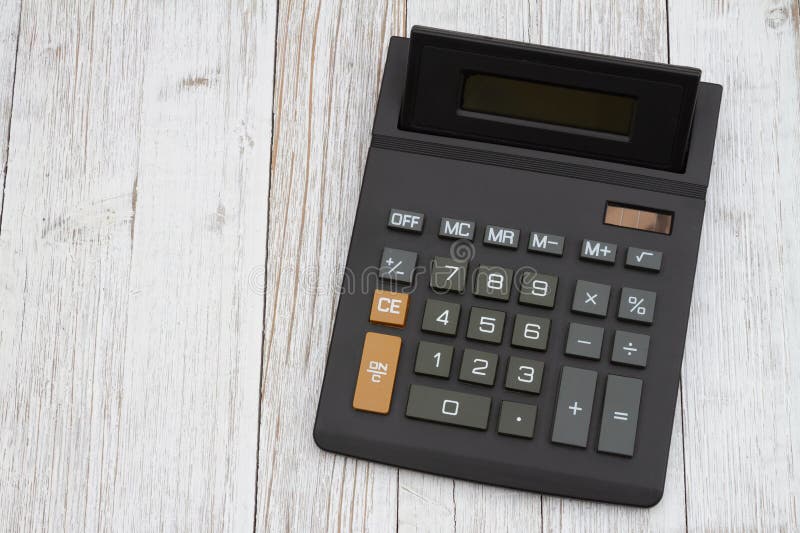 A Black Calculator on Wood Desk Stock Image - Image of texture, black ...