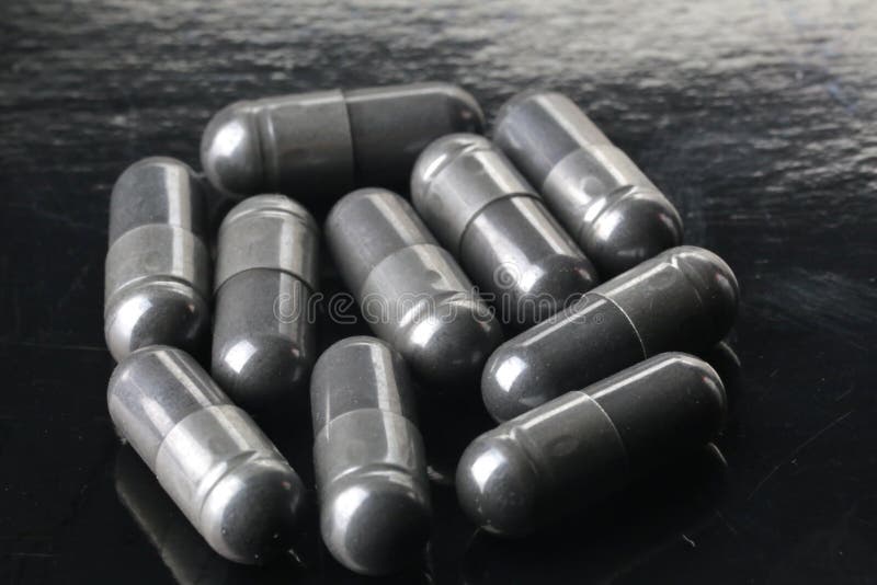 Black capsules stock image. Image of attention, doctor - 86402913