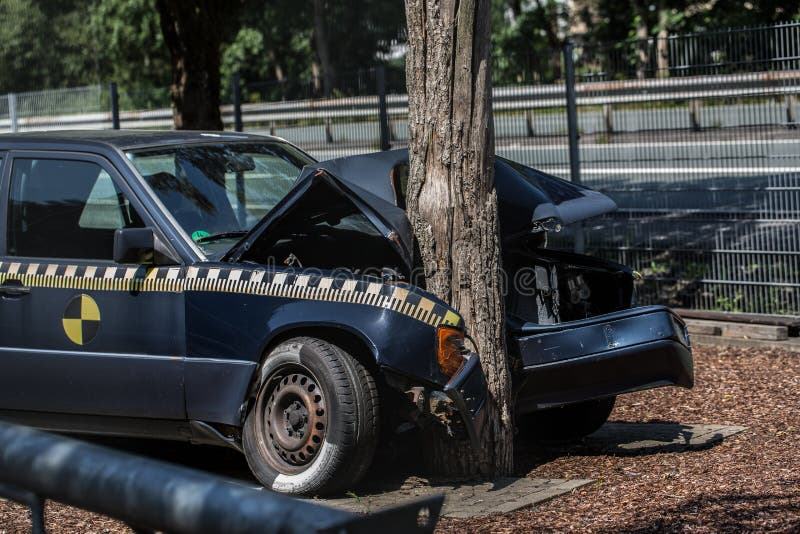 Black Car Drives Head-on Against Tree Stock Photo - Image of crash ...