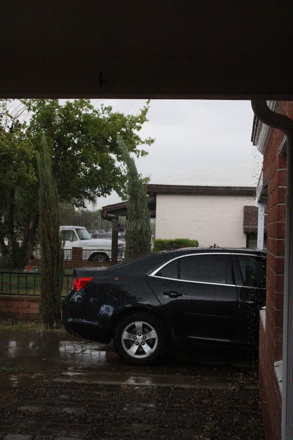 Black Car Parked Outside on a Rainy Day Stock Image - Image of parked ...