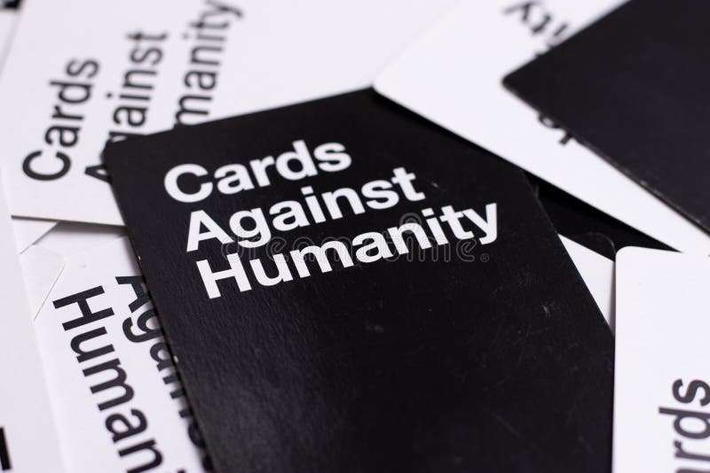 Black Cards Against Humanity Card Viewed at an Angle, Flat Lay of Many ...