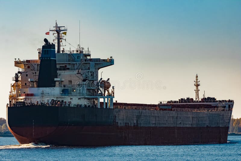 Black cargo ship stock image. Image of logistic, back - 88472165