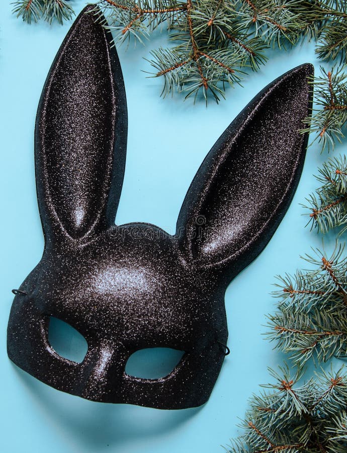 Black Mask of Rabbit on Blue Background. Stock Photo - Image of ...