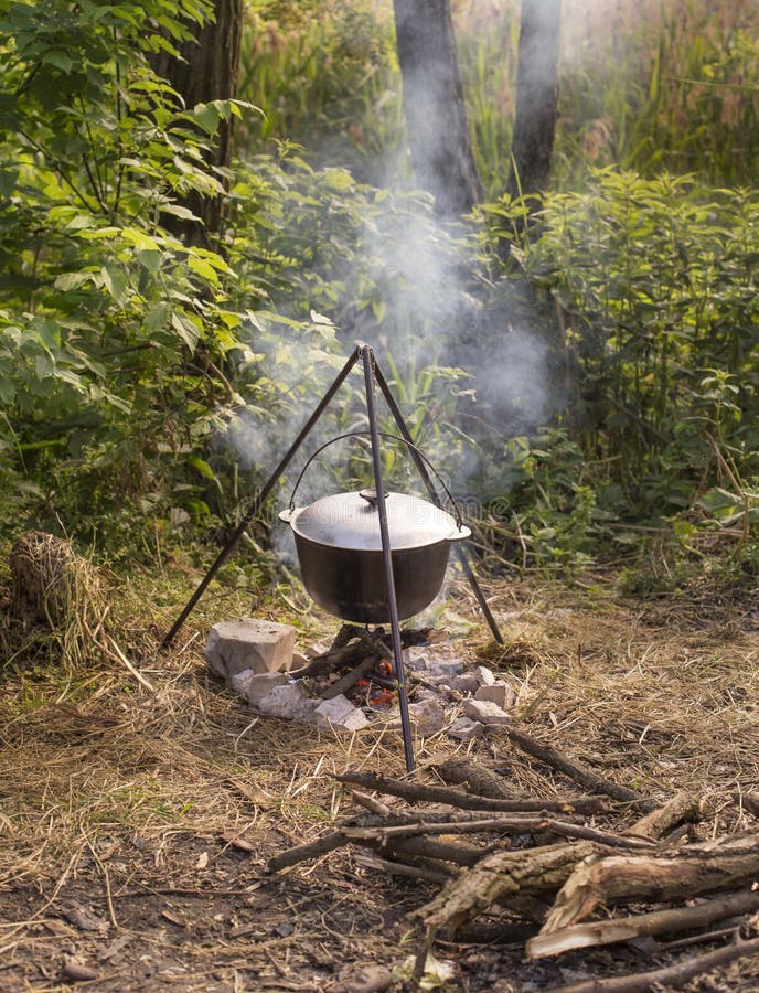 Black Cauldron Stands on the Stake Stock Photo - Image of nature ...