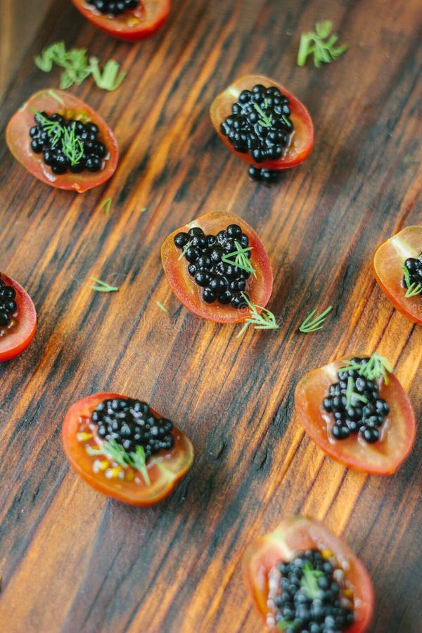 Black Caviar Appetizers on the Wooden Board Stock Photo - Image of ...