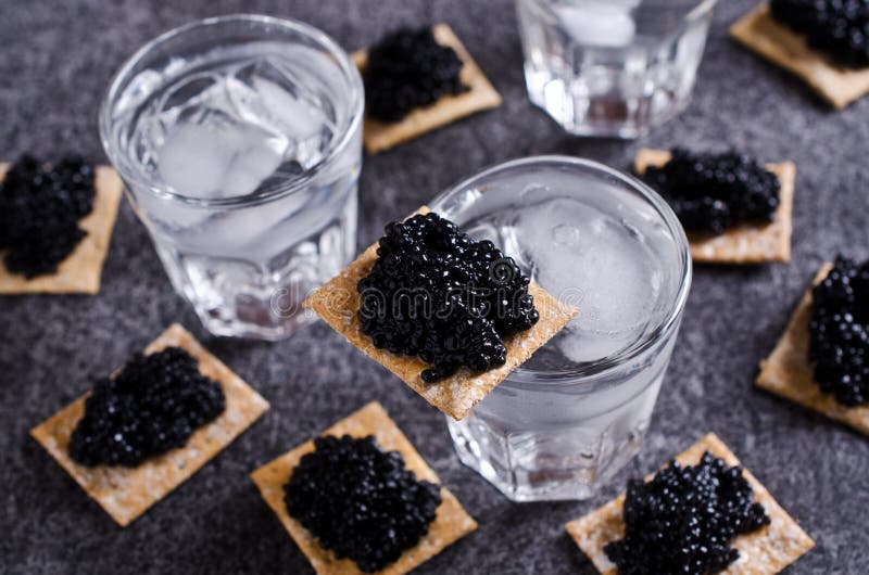 Black caviar on a cracker stock image. Image of dark - 67648559