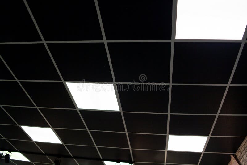 Black Ceiling with Neon Light Bulbs in Uprisen View. Fluorescent Light ...