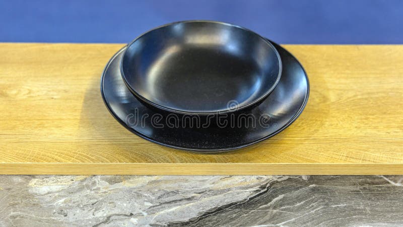 Black Ceramic Plates stock photo. Image of 2022, plate - 261517452