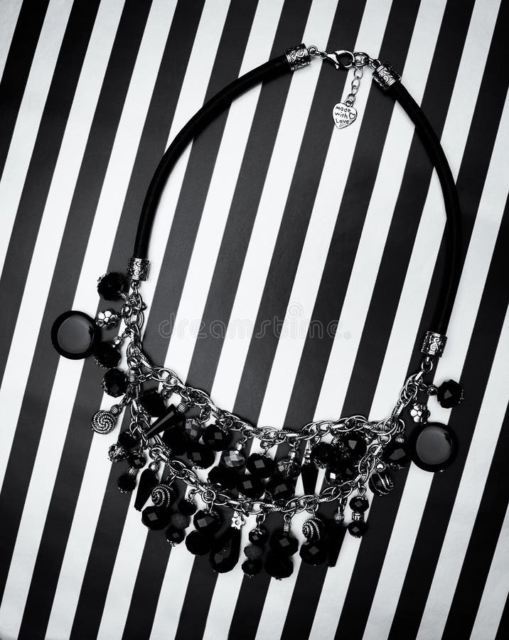 Black Chain Necklace on Striped Background Stock Image - Image of ...