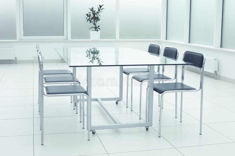 Black Chairs Glass Table in Bright Large Studio Office Space. Workspace ...