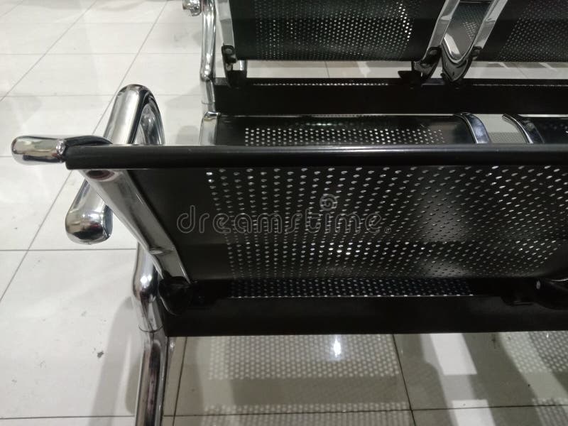 Black Chairs are Used As Queue Seating in Hospitals Stock Image - Image ...