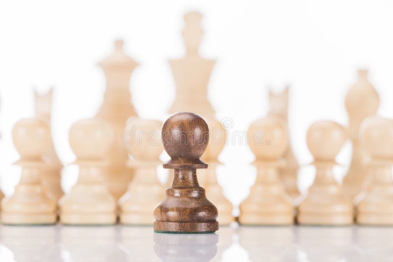 Black Chess Pawn in Front of White Figures Stock Photo - Image of ...