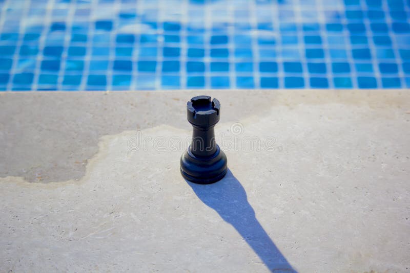 Black Chess Pieces at the Pool Stock Photo - Image of game, resort ...