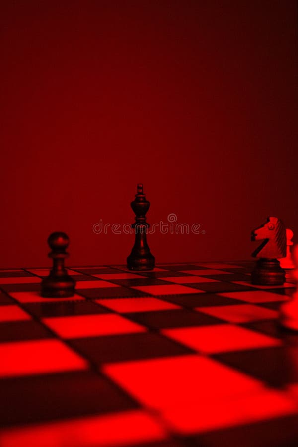 Black Chess Pieces in the Red Lightning Stock Photo - Image of game ...
