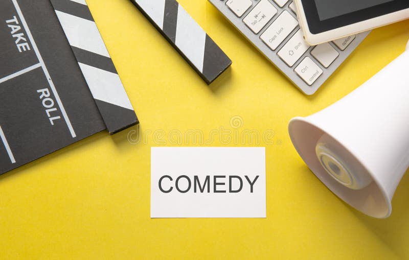 Black Clapper Board with a Comedy Word on Paper Stock Image - Image of ...