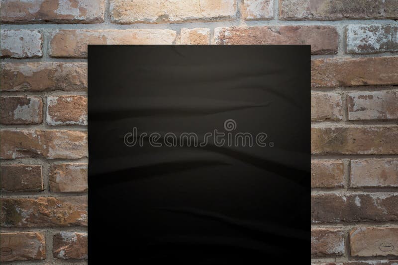 Black Clean Poster on Brick Wall with Lamp Light Over Stock Image ...