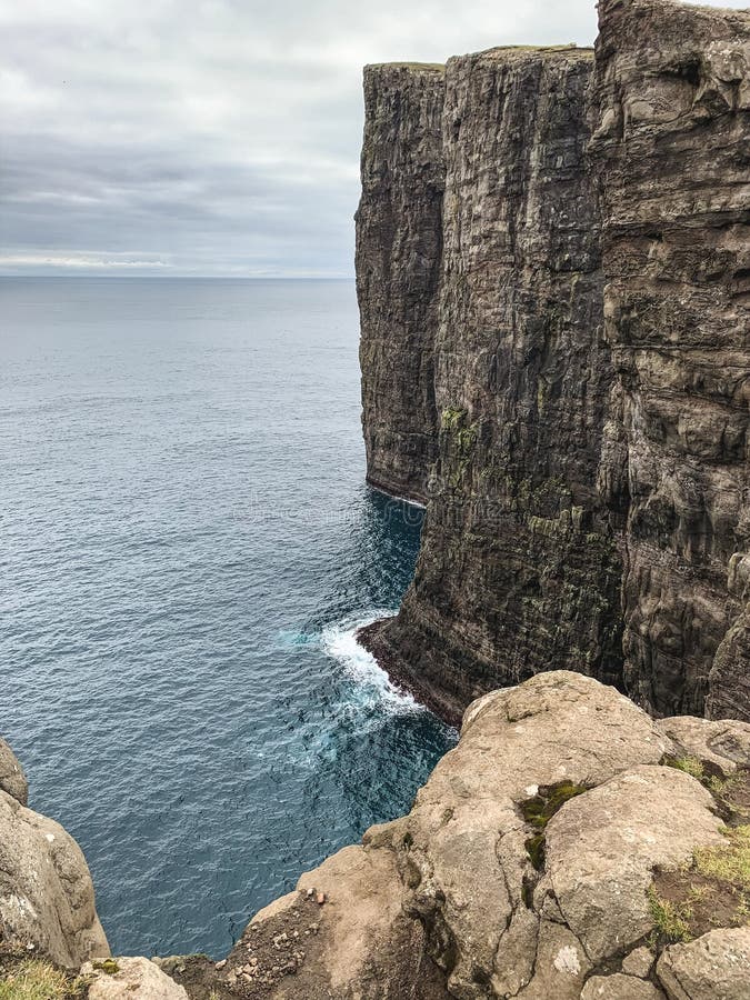 Black Cliffs Formation in the Atlantic Ocean, Faroe Islands Stock Photo ...