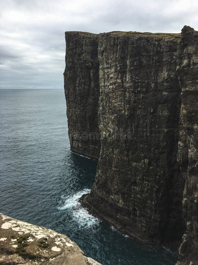 Black Cliffs Formation in the Atlantic Ocean, Faroe Islands. Towering ...