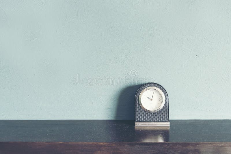 Black Clock at Blue Wall Time Management Stock Image - Image of ...