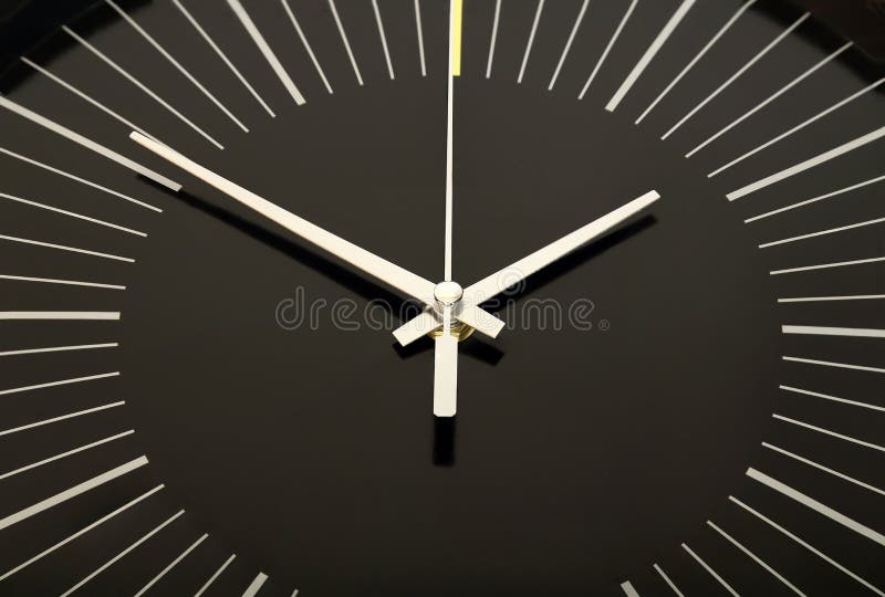Black clock on wall stock photo. Image of dial, alarm - 35325754