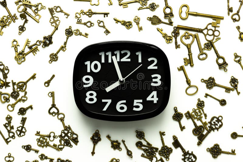 Black Clock and Pile of Keys Isolated on White Background Stock Image ...
