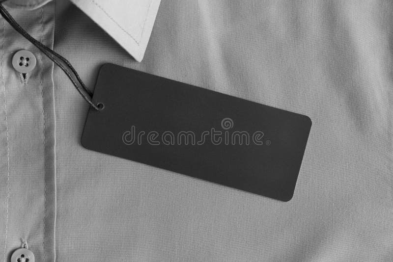 Black Clothing Tag Mockup on a Grey Shirt Stock Photo - Image of shop ...