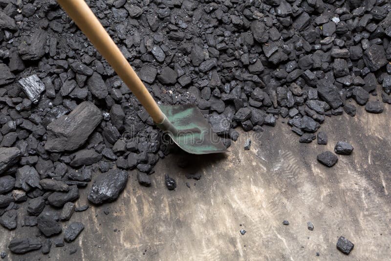 Black Coal and Shovel Lying on a Pile in House Basement Stock Image ...