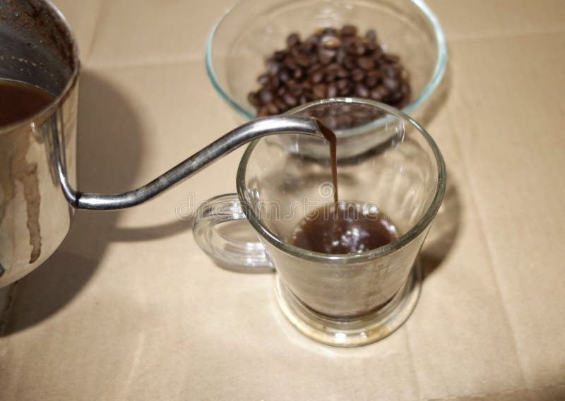 Black Coffee Being Poured on the Cup Stock Image - Image of drink ...