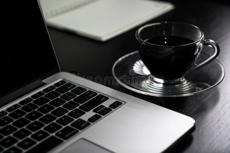 Black Coffee in a Glass beside the Laptop Stock Photo - Image of laptop ...