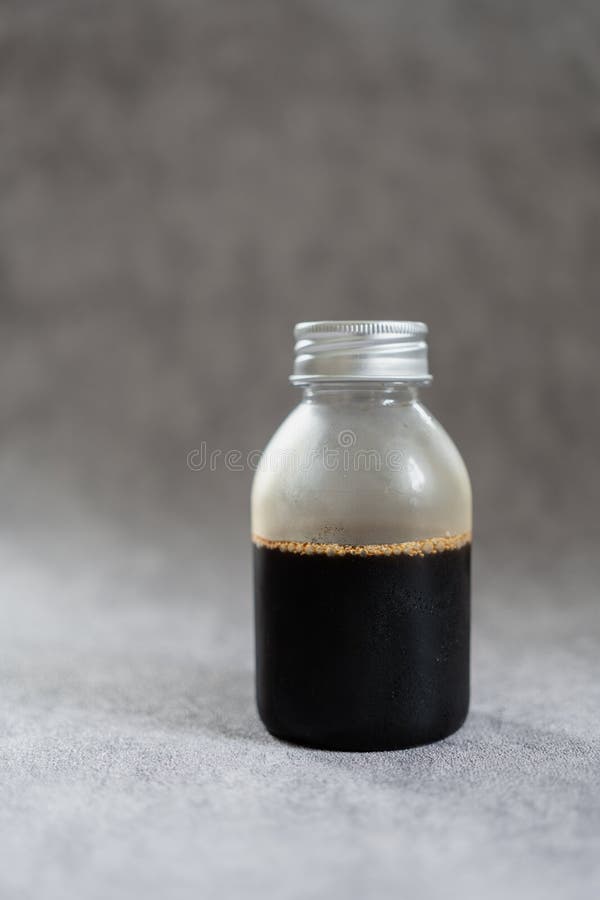 Black Coffee in Plastic Bottle with Lid Silver Stock Photo - Image of ...