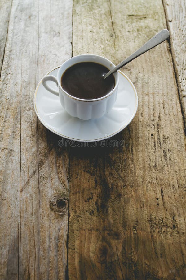 Black Coffee on Rustic Table Stock Image - Image of verticalcopy ...