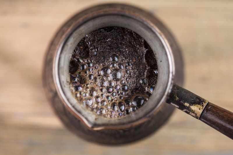 Black Coffee in Turkish Coffee Pot, Top View on Wood Table Stock Image ...