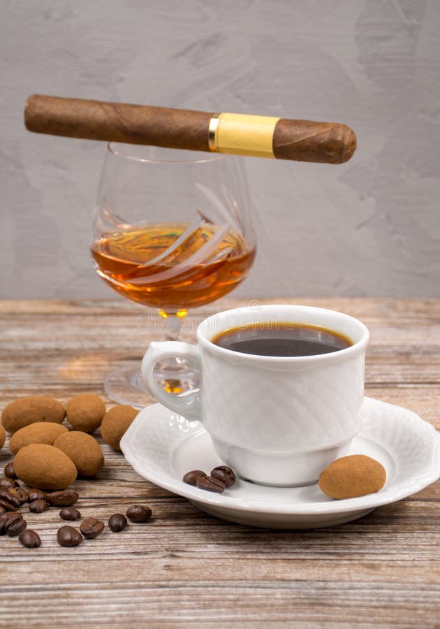 Black Coffie and Glass with Brandy Served with Grape and Chocolate ...