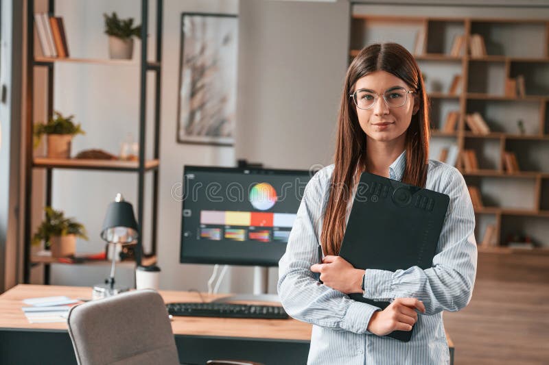 With Black Colored Notepad. Standing and Posing Stock Photo - Image of ...