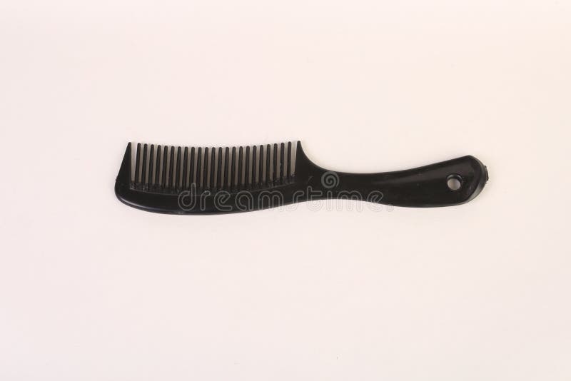 A Black Comb on an All White Back Ground Stock Image - Image of head ...