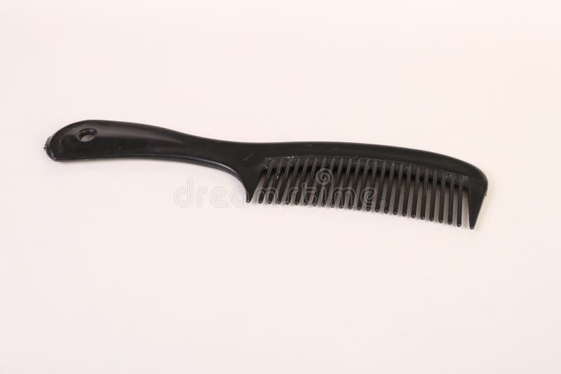 A Black Comb on an All White Back Ground Stock Photo - Image of ...