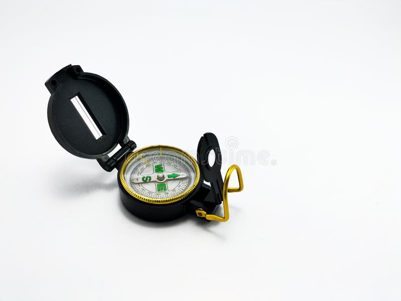 A Black Compass with a Hinged Lid Rests on a White Surface. Stock Image ...